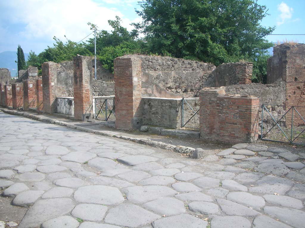 Via Consolare, Pompeii. May 2010. Looking south along west side, with ...